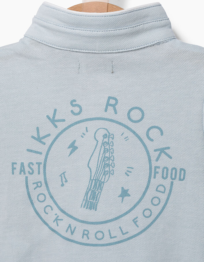 Polo azul con cuello alto bebé niño