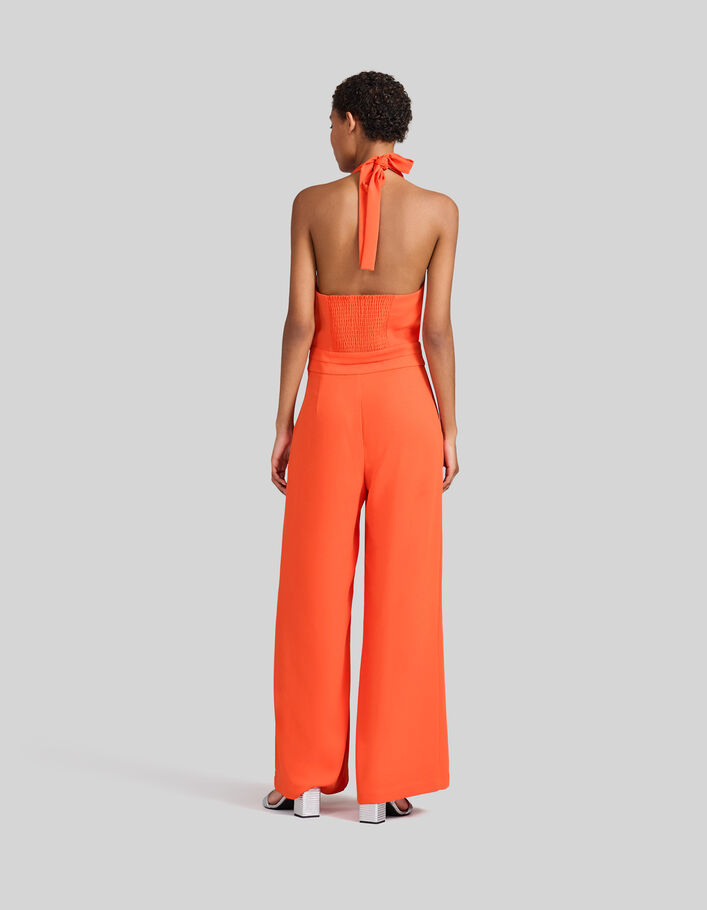 Oranje jumpsuit blote rug Dames