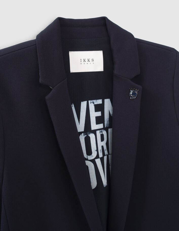 Women’s navy suit jacket with striped collar and sleeves