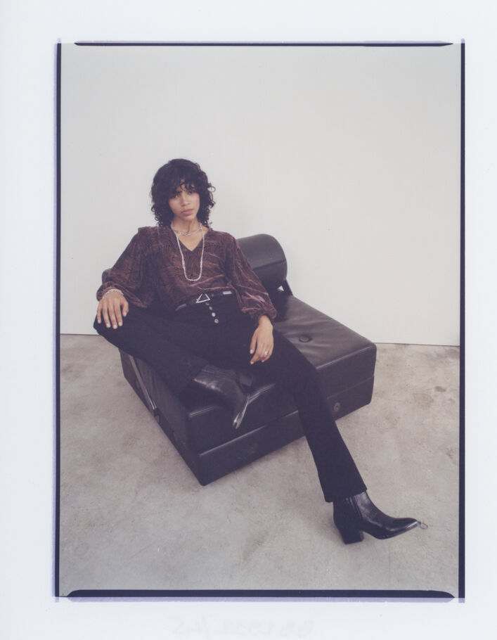 Women’s black button-up high-waist flared jeans