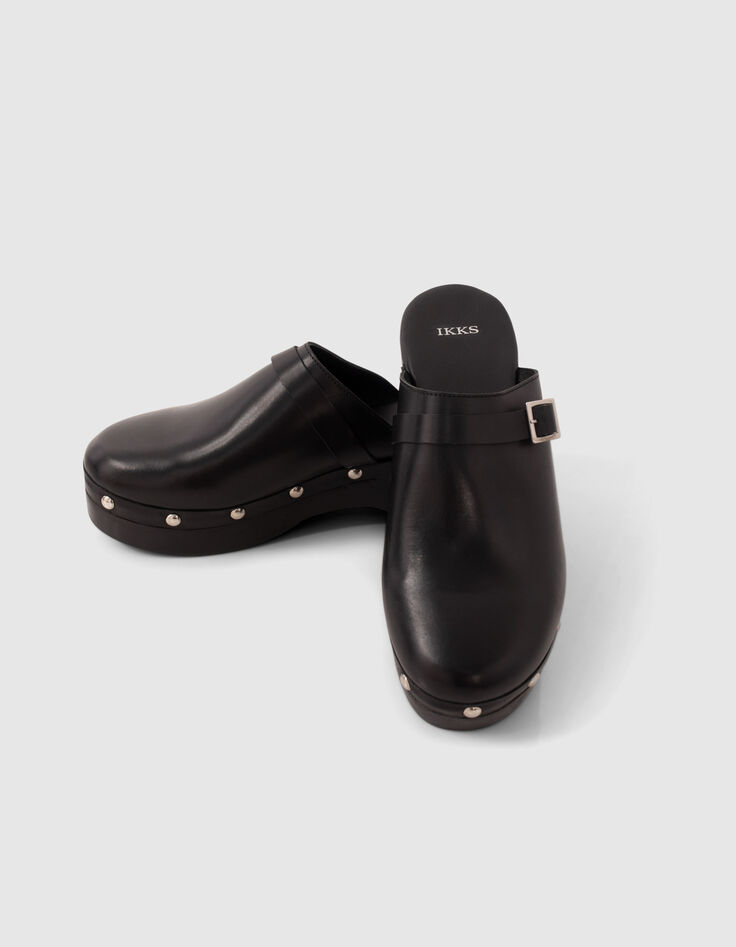 Women’s black studded leather clogs with wooden heel