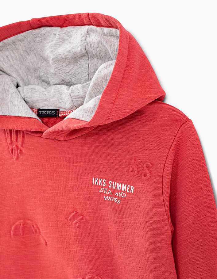 Sweat corail à capuche motifs embossés garçon